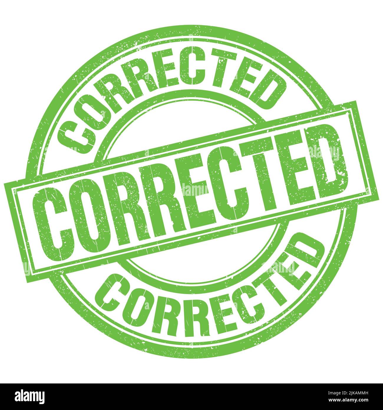 CORRECTED text written word on green round stamp sign Stock Photo - Alamy