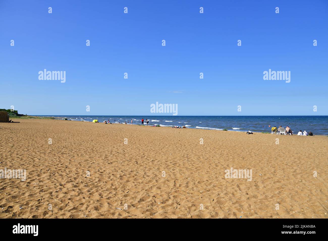 Derbent, Russia - 26 July, 2022: People relax on the beach of the ...