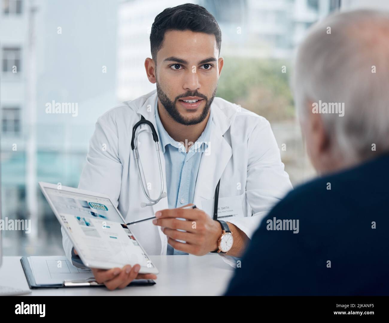 Doctor serious chart hi-res stock photography and images - Alamy