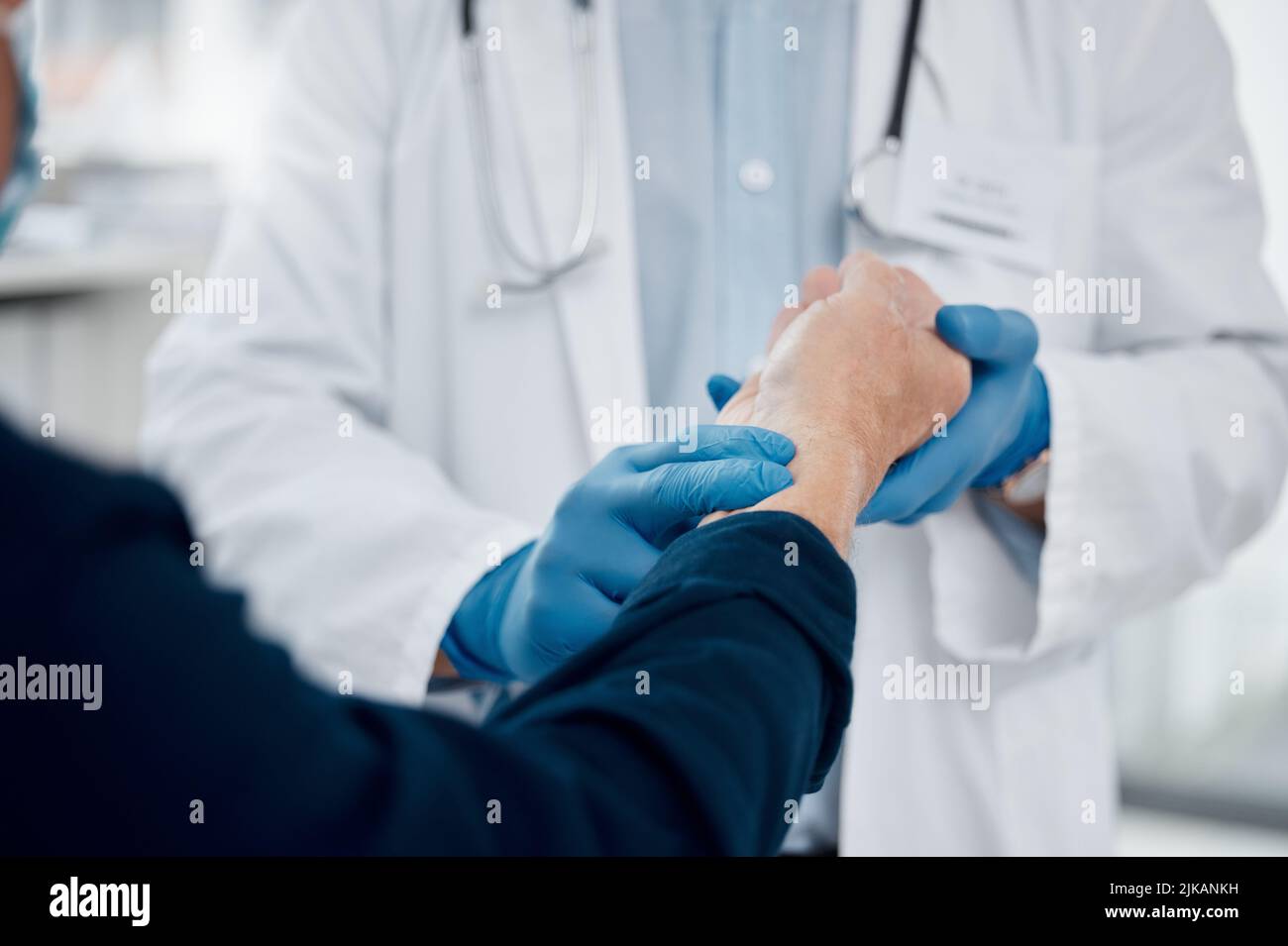 Im just feeling your pulse. an unrecognizable doctor checking a ...