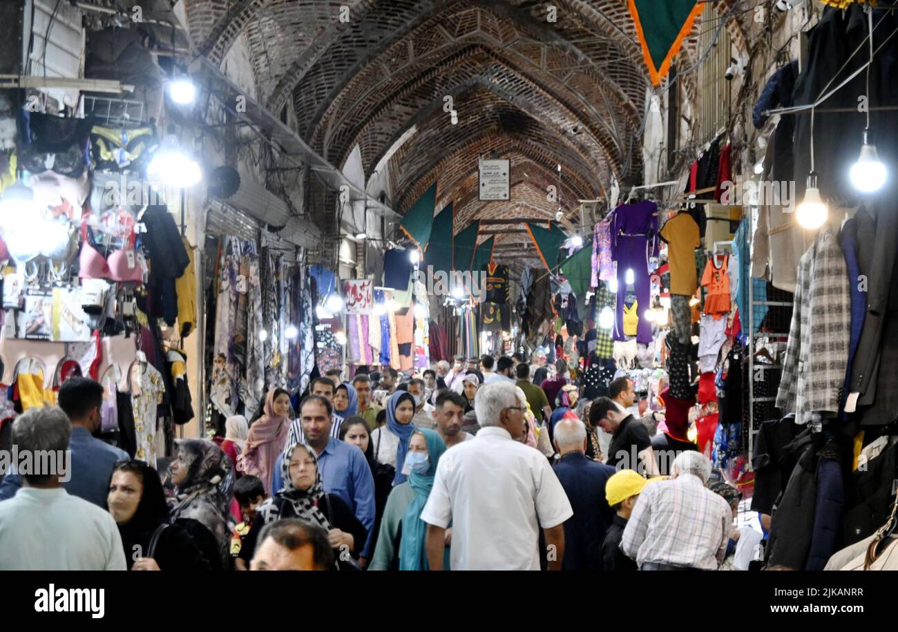 Shoppers walk in the historic bazaar complex in Tabriz, northwestern ...