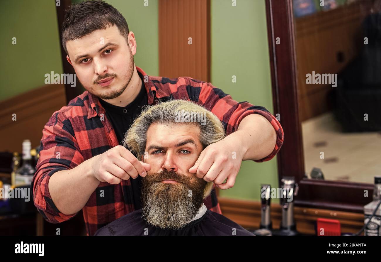 how do you like it. mature caucasian guy with moustache. male barber ...