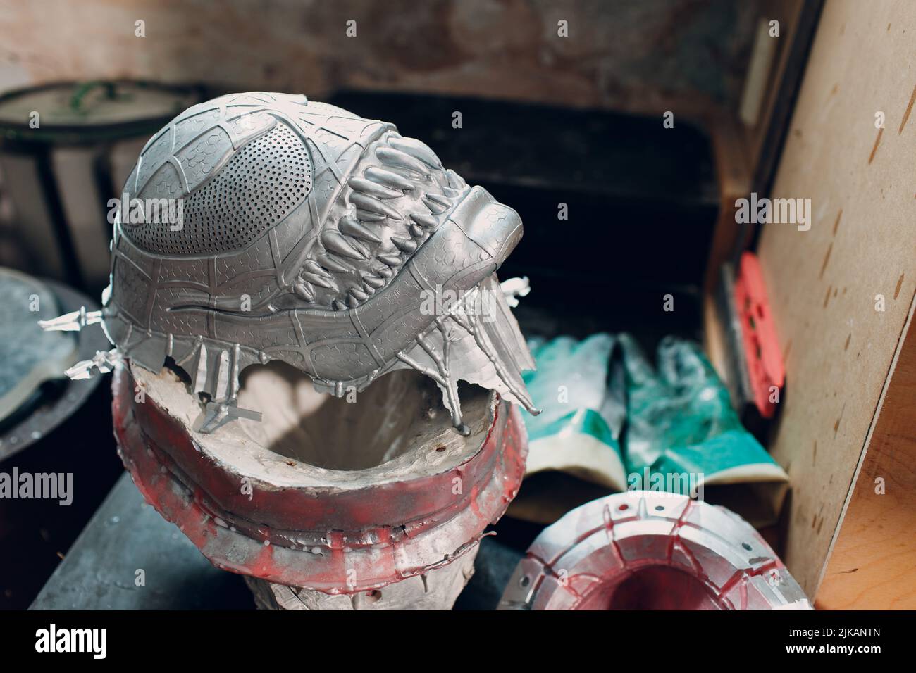 Artisan craftsman create mask based on plaster cast. Gypsum mold and ...