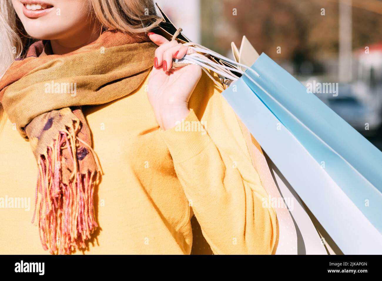 autumn shopping lady packages autumn city street Stock Photo - Alamy