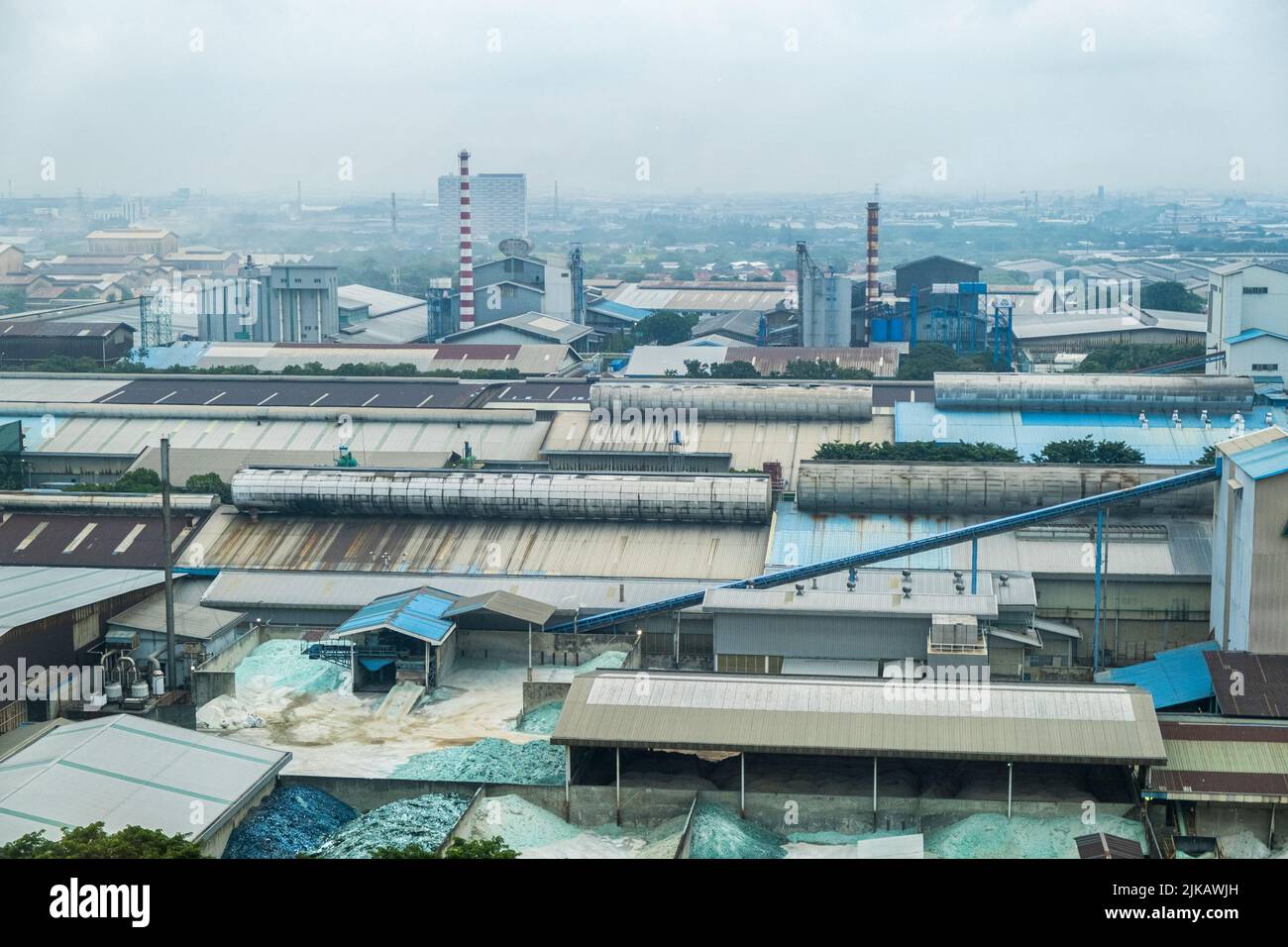 Glass factory. Top view of the piles of crushed glass on the territory ...