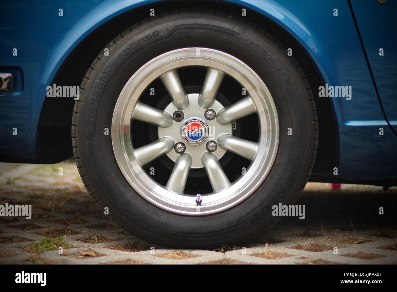 Vintage Datsun wheel close-up shot in a cloudy day Stock Photo - Alamy