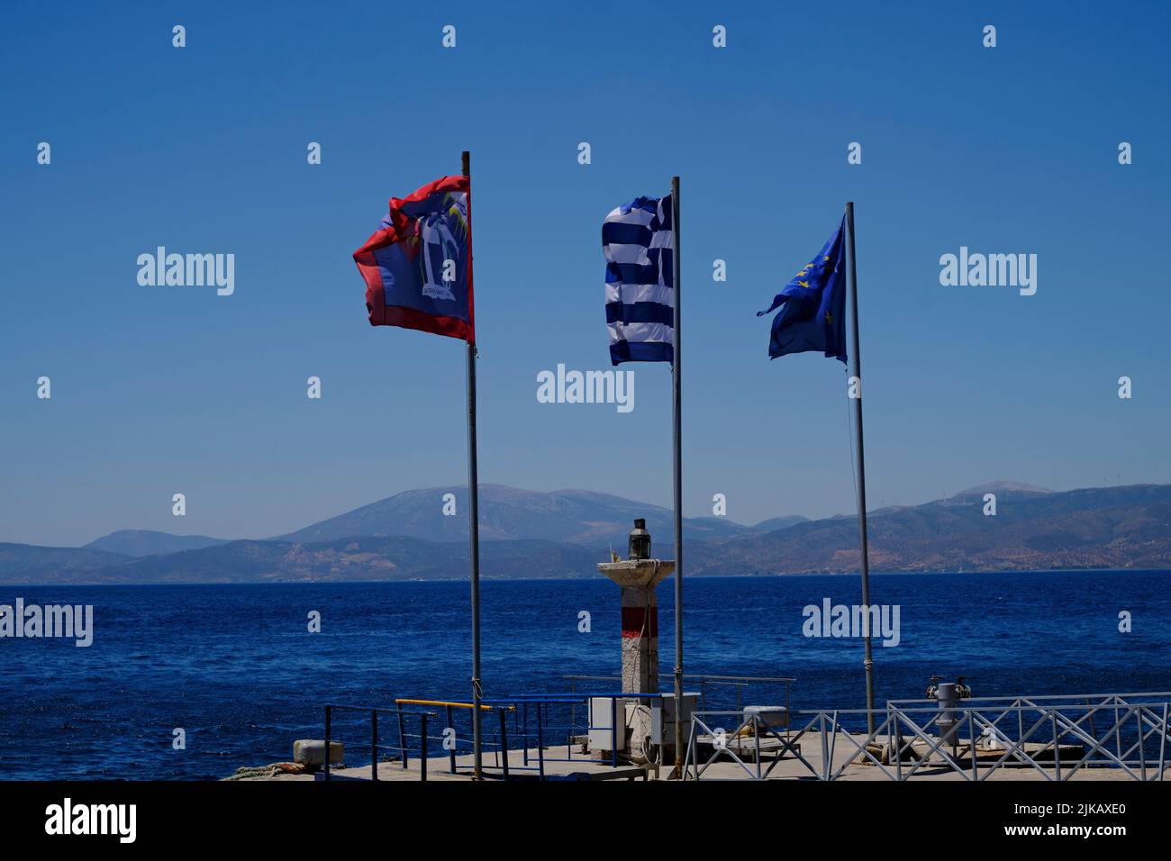 Flags fluttering on the island of Hydra in Greece Stock Photo - Alamy