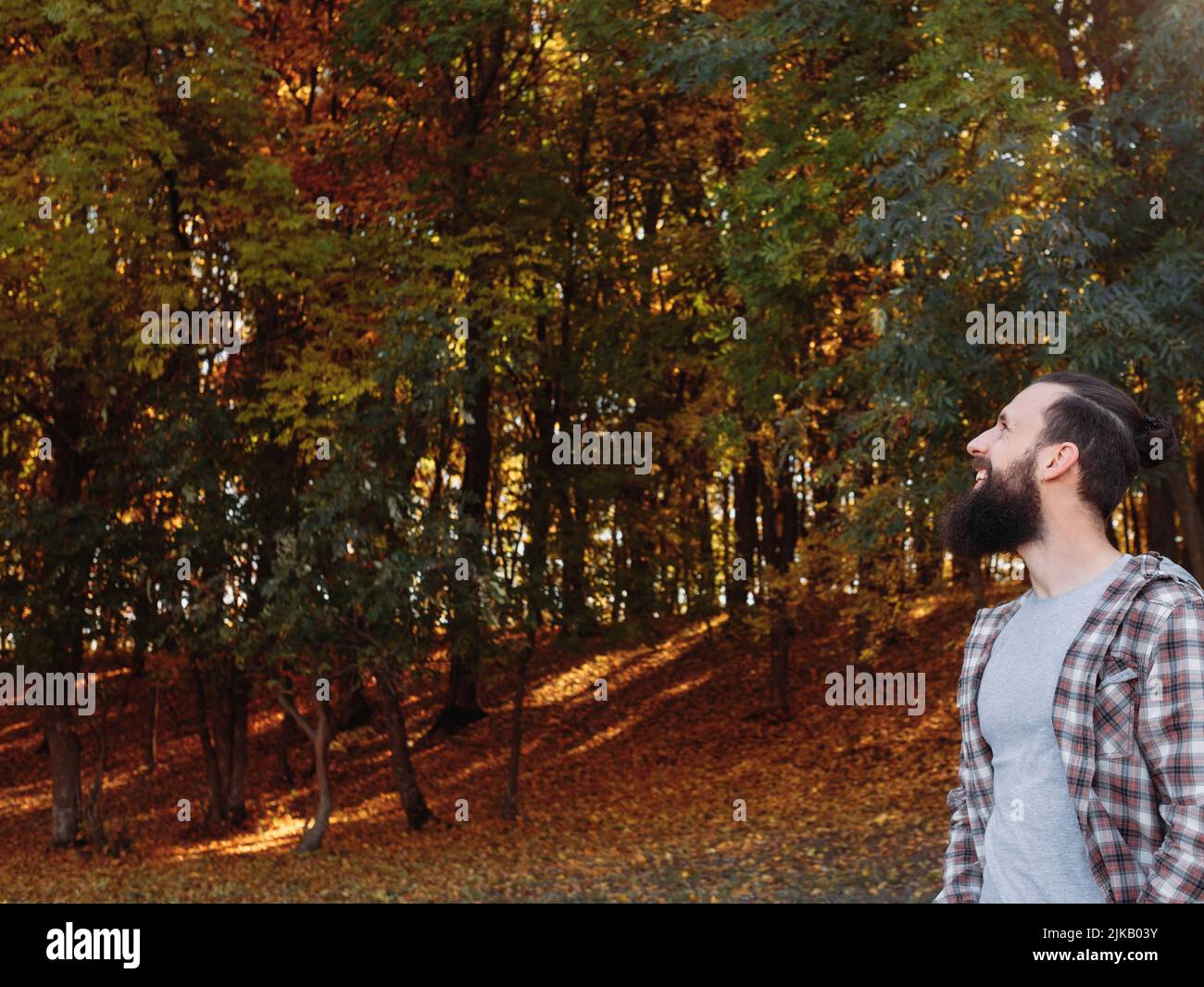 fall landscape happy male tourist nature park Stock Photo - Alamy