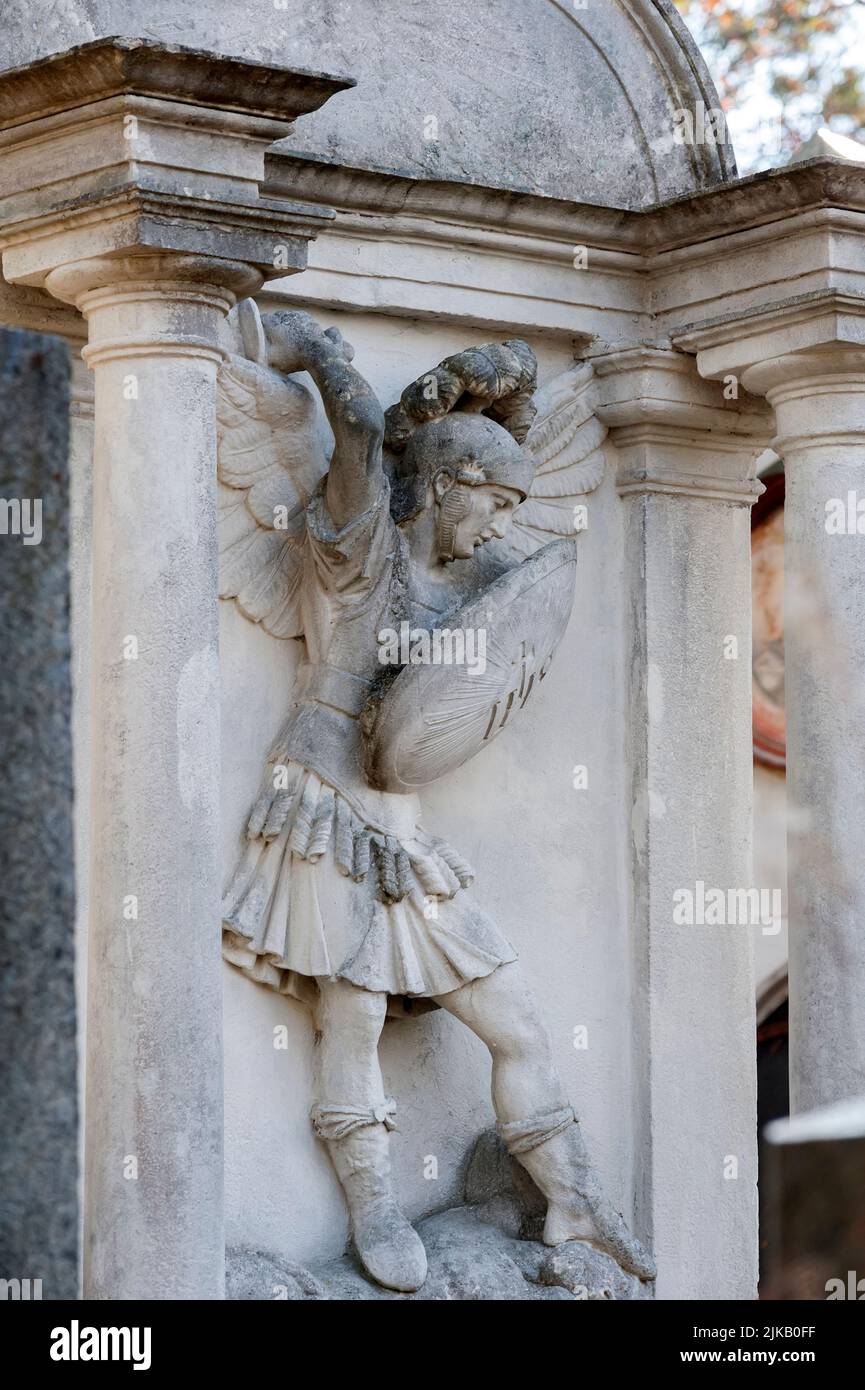 Tomb sculpture of a warrior on a wall of ancient crypt at Lychakiv ...