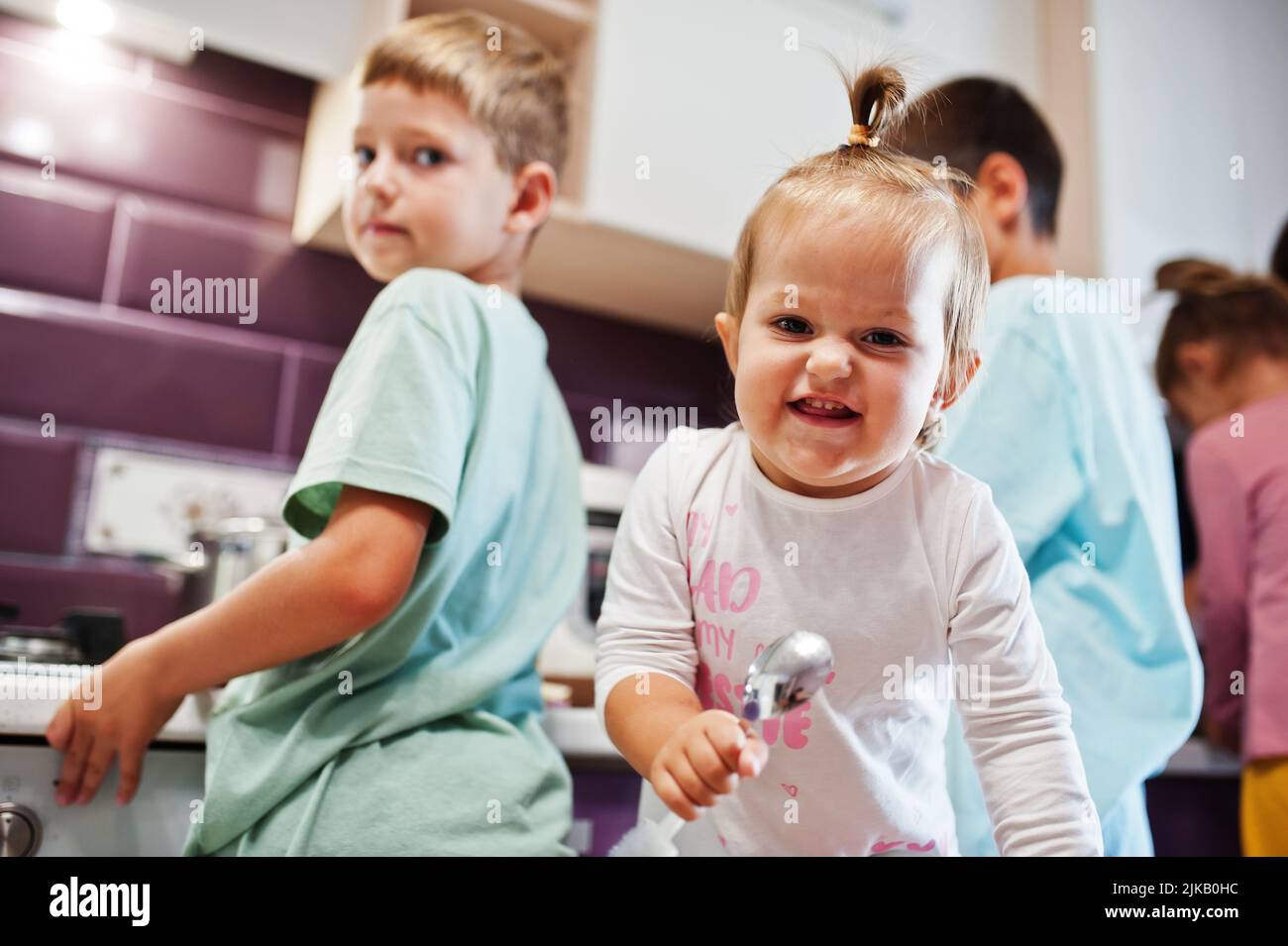 Kids cooking at kitchen, happy children's moments Stock Photo - Alamy