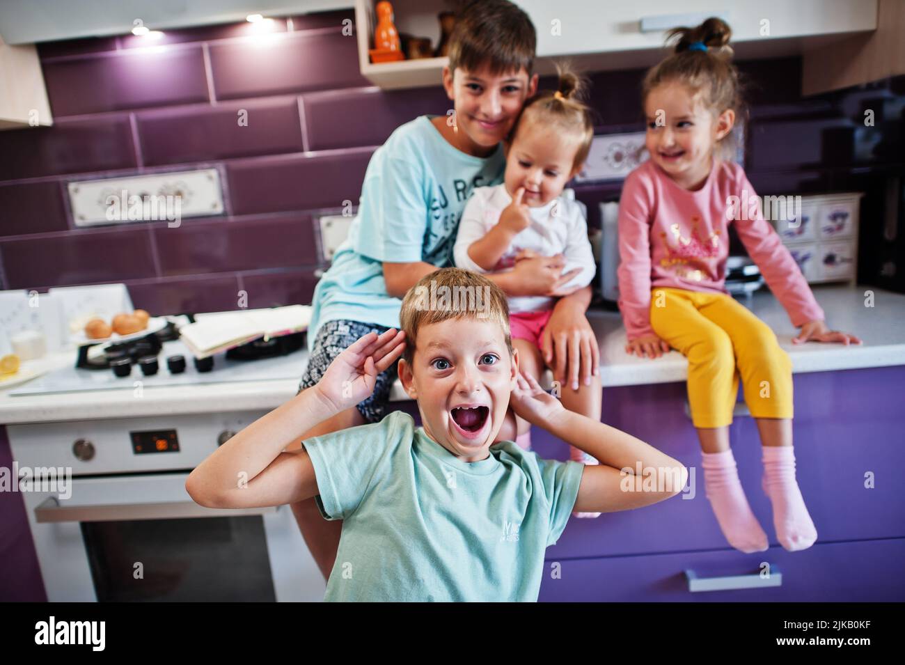 Kids cooking at kitchen, happy children's moments Stock Photo - Alamy