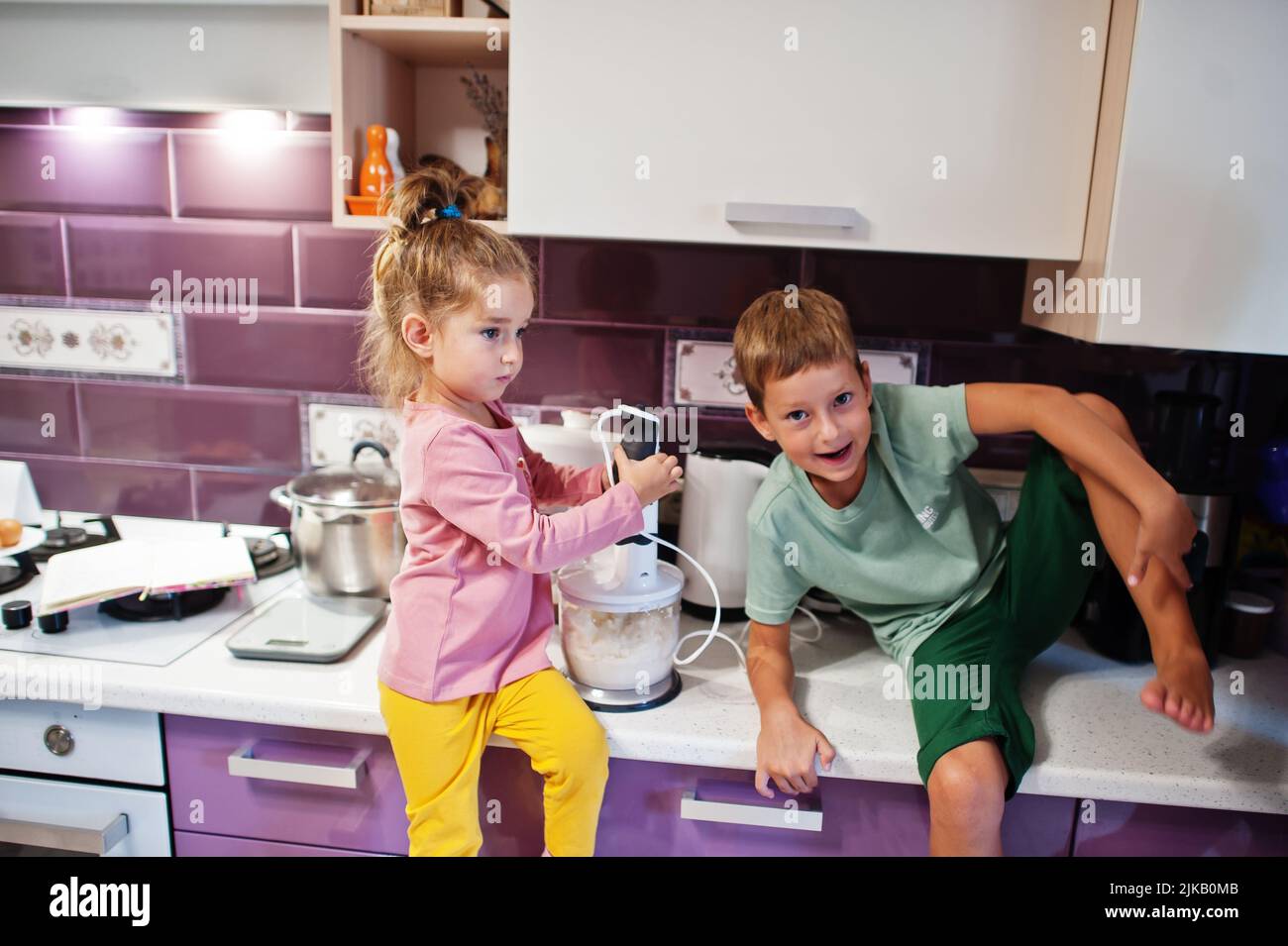 Kids cooking at kitchen, happy children's moments Stock Photo - Alamy