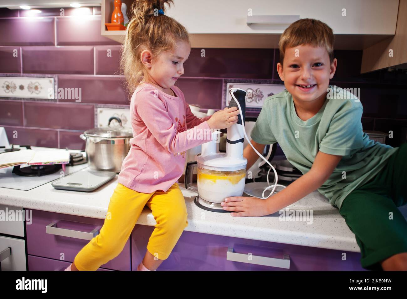 Kids cooking at kitchen, happy children's moments Stock Photo - Alamy