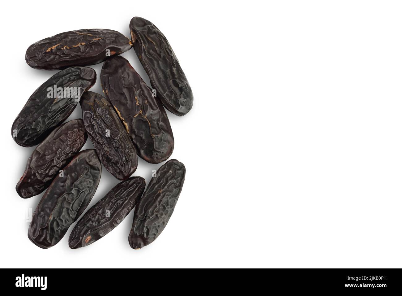Tonka bean isolated on white background. Bean of Dipteryx odorata. Top ...