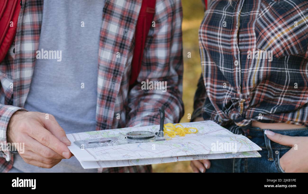 hiking tourism hobby travelers compass map Stock Photo - Alamy