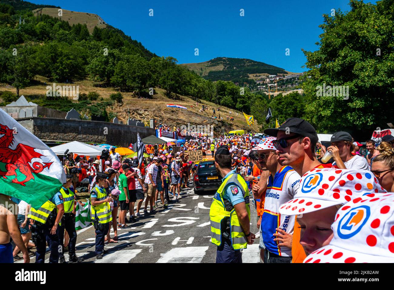 Cycling fans lining the route up Alpe d'Huez during the 2022 edition of ...