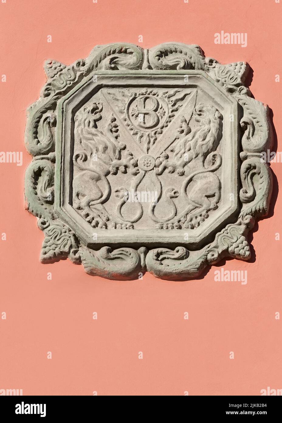 Coat of arms with snakes and lions on an old building on Market Square ...