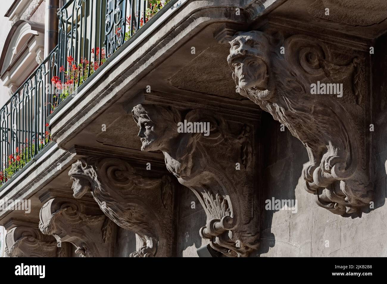 Architectural corbels on the old building on Market Square in Lviv ...