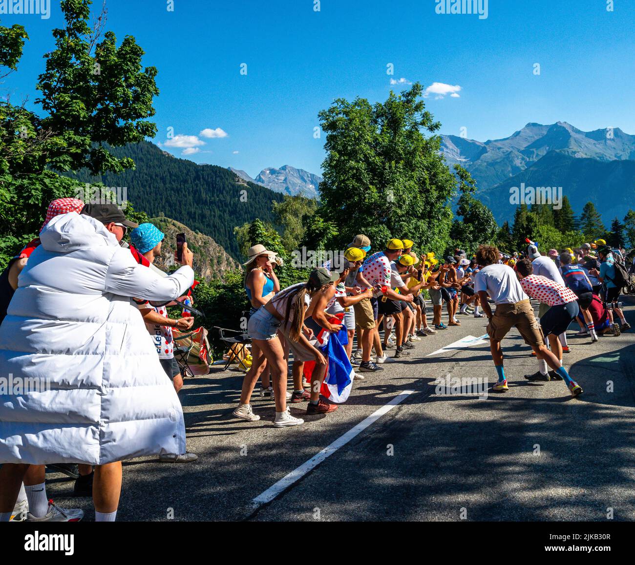 Cycling fans lining the route up Alpe d'Huez during the 2022 edition of ...