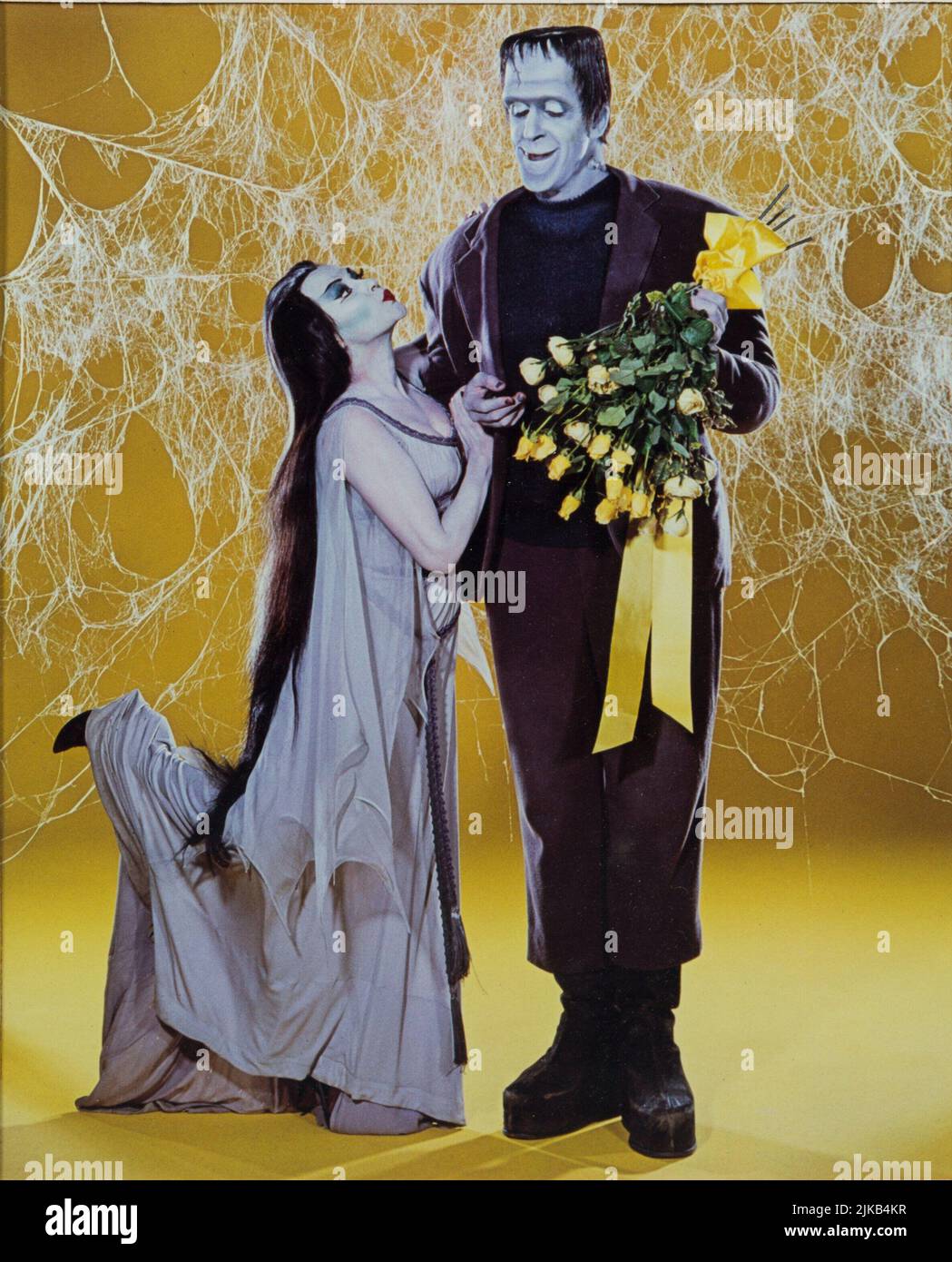 YVONNE DE CARLO and FRED GWYNNE in THE MUNSTERS (1964), directed by ...