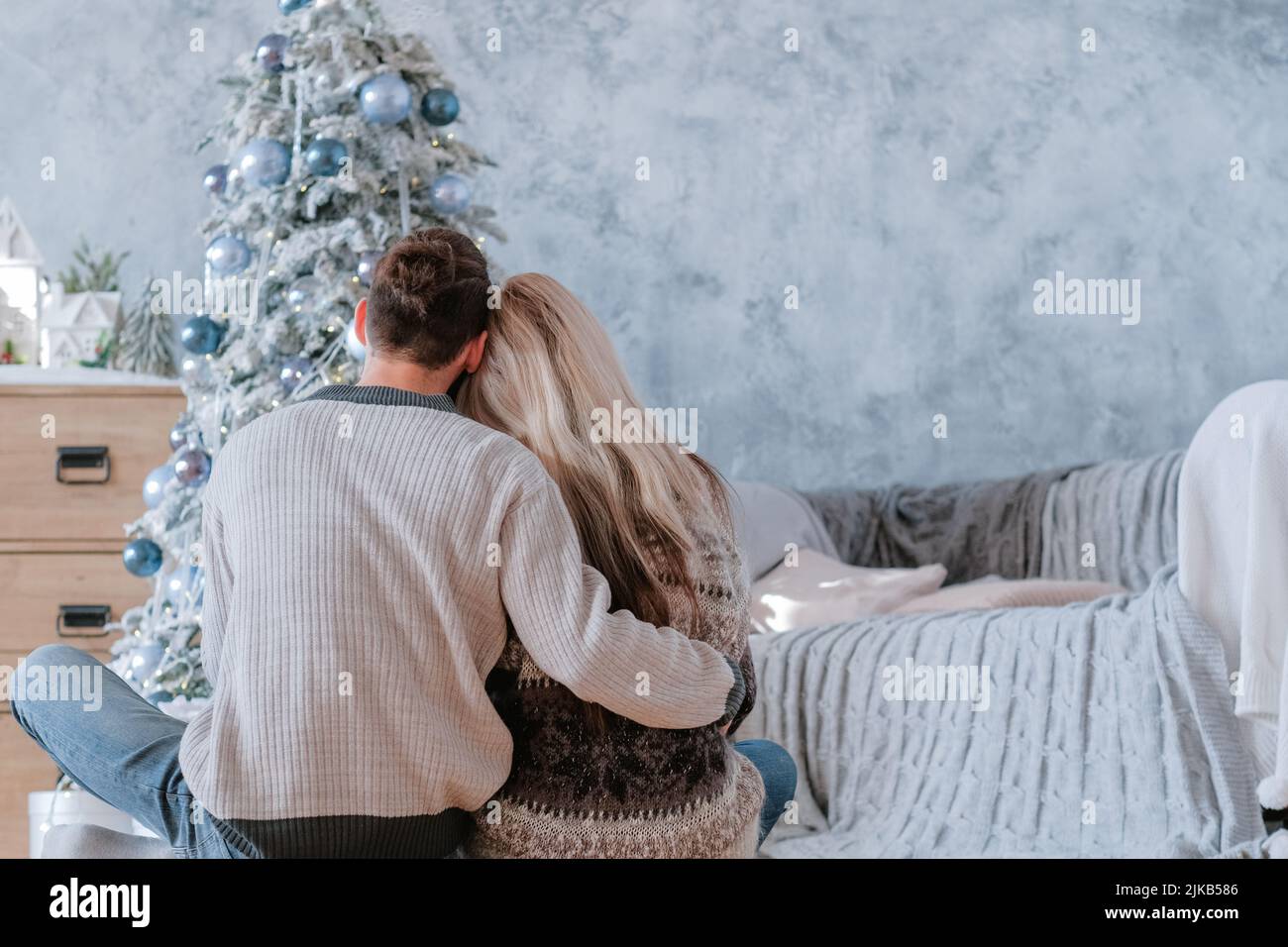 romantic winter holidays peaceful couple fir tree Stock Photo - Alamy