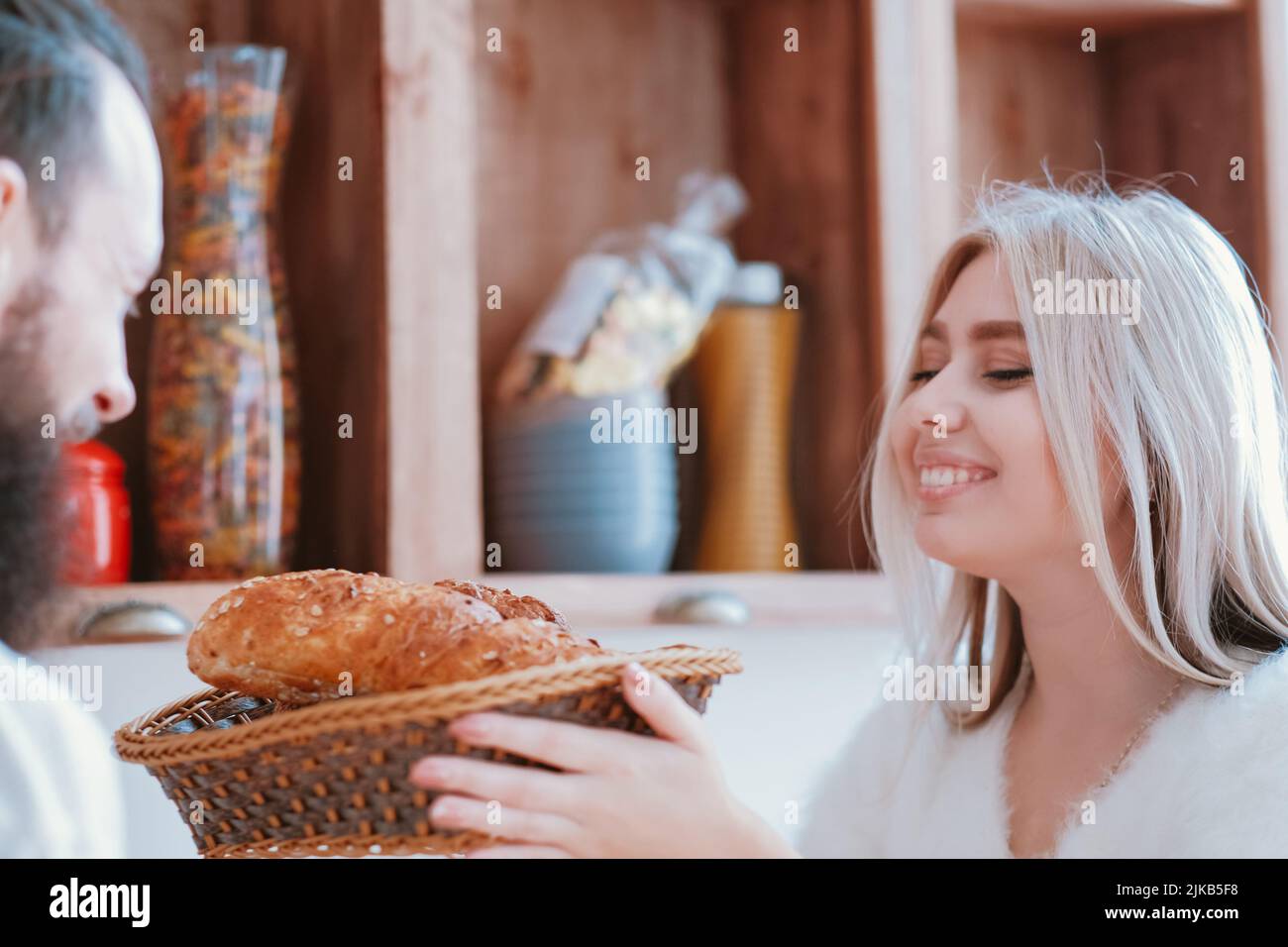 happy family relationship lady bread kitchen Stock Photo - Alamy