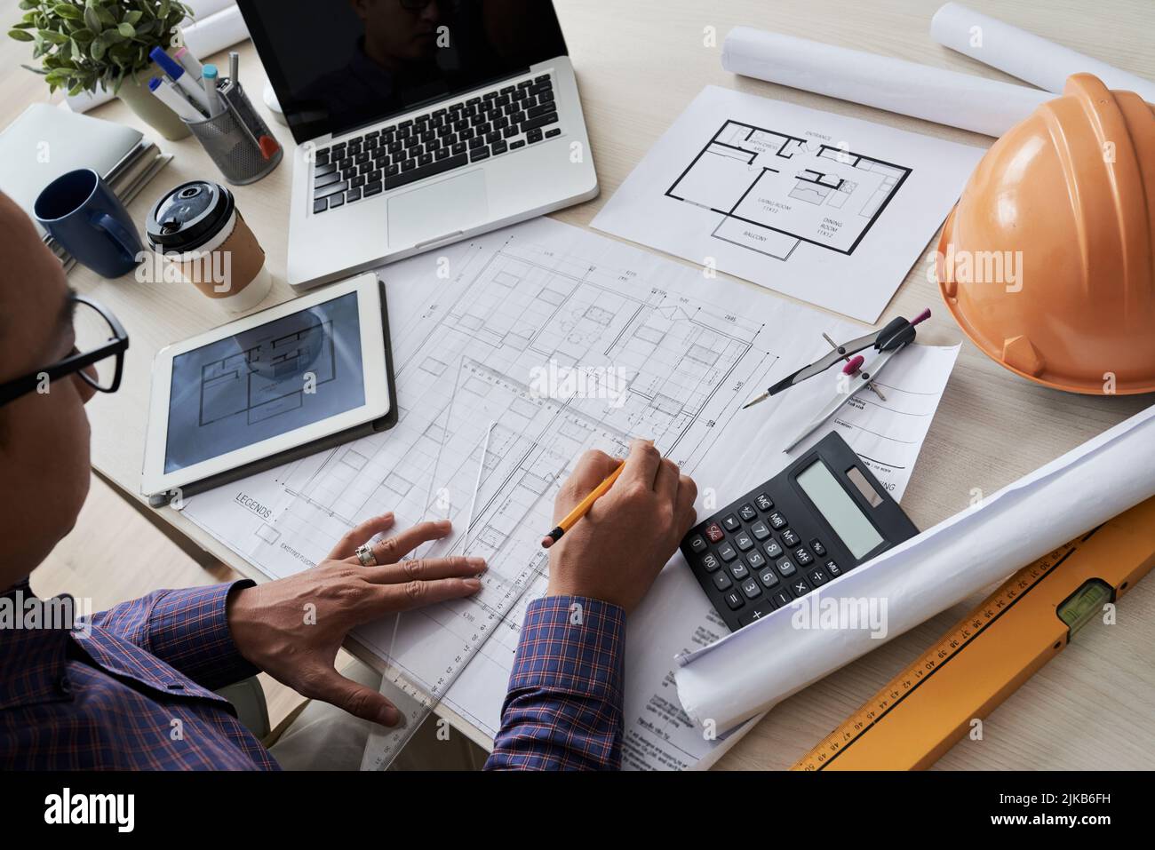 Businessman working on building project hi-res stock photography and ...