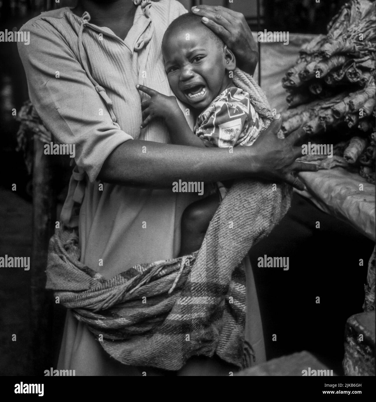 African mother baby crying hi-res stock photography and images - Alamy