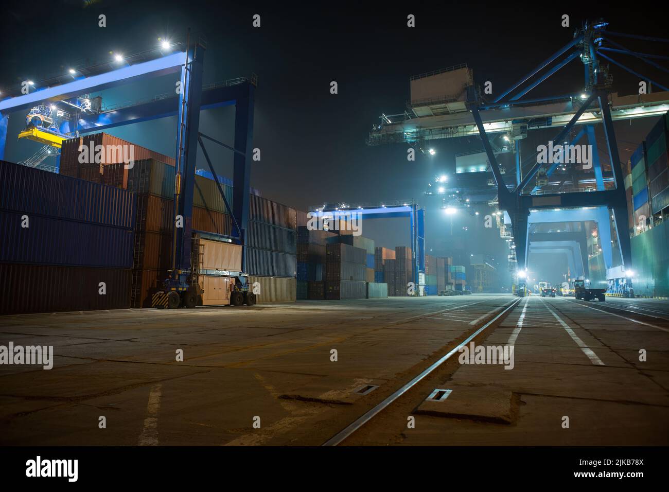 industrial port with containers. Stack of containers, gantry crane at ...