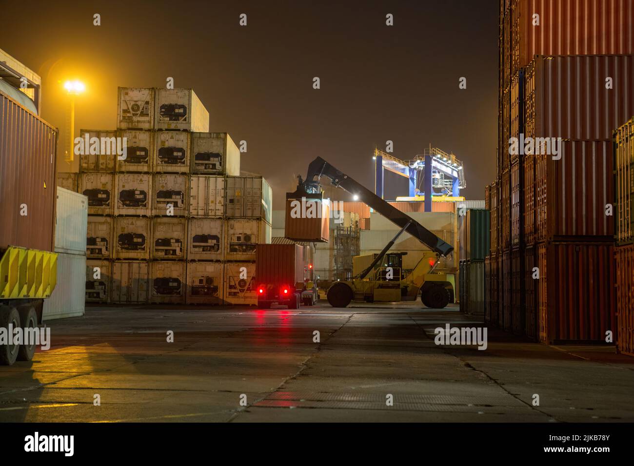 industrial port with containers. Stack of containers, gantry crane at ...