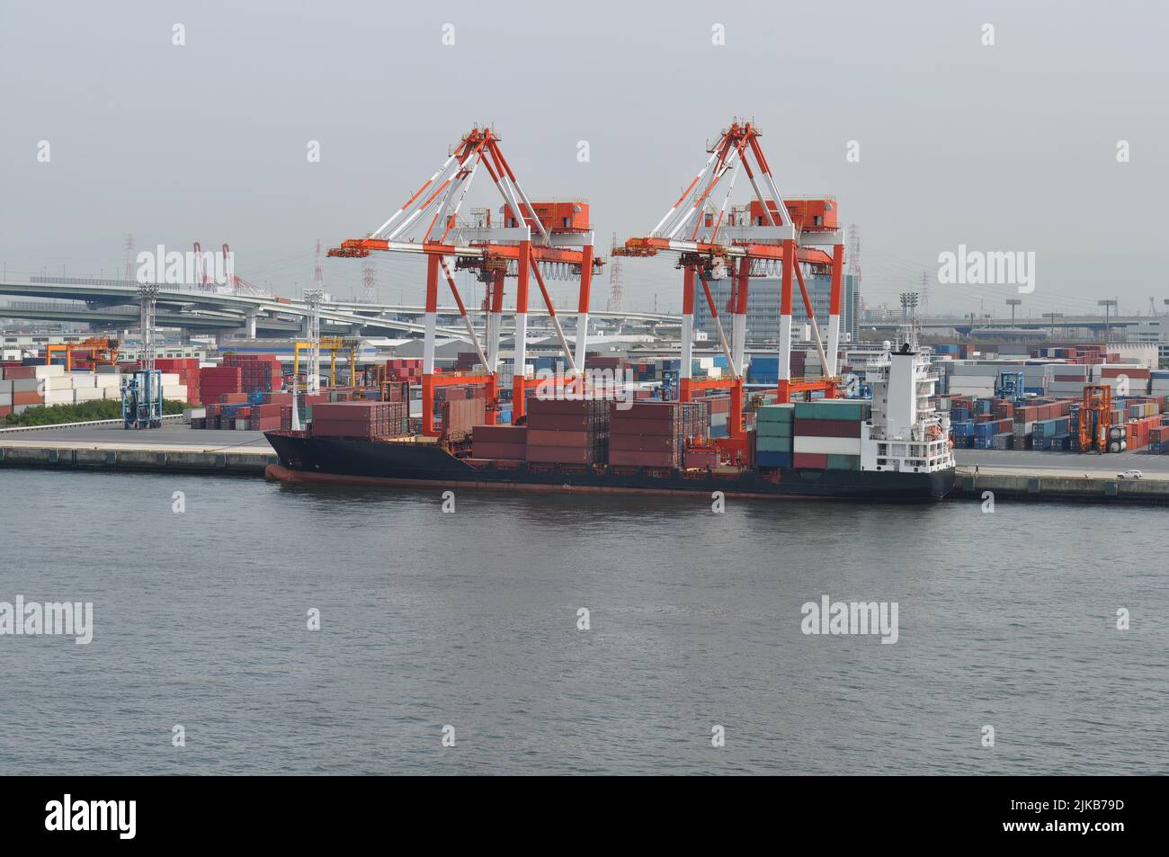 industrial port with containers. Container ship at sea port at terminal ...