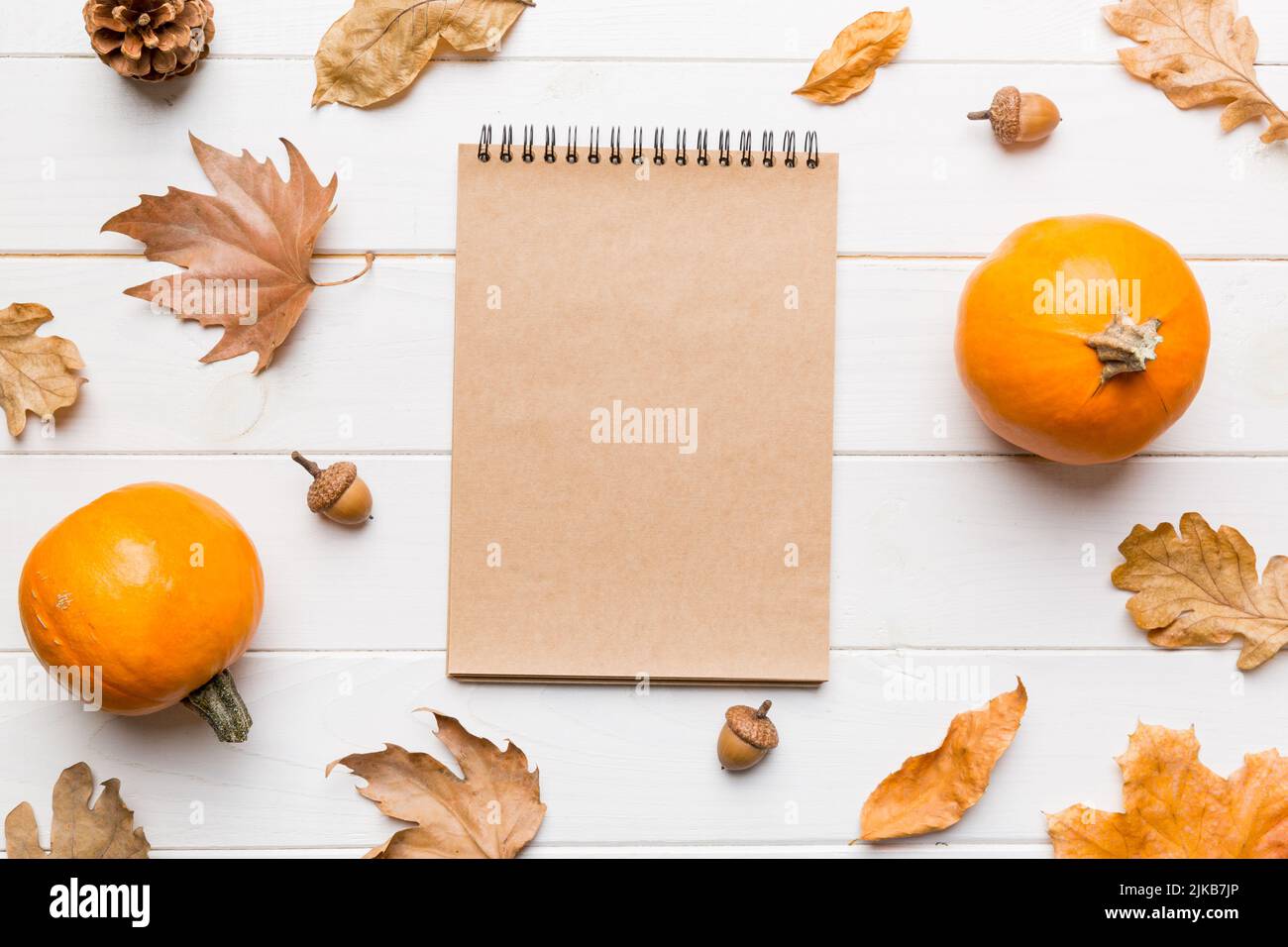 Autumn composition: fallen leaves and craft sketchbook mock up on ...