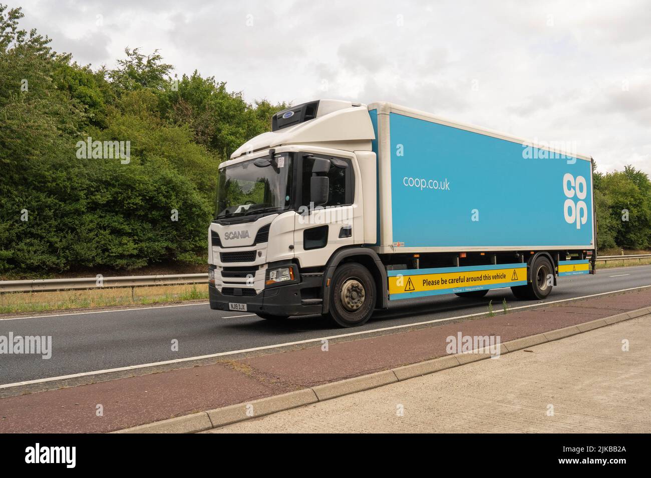 Co-op refrigerated rigid lorry travelling along the Southern bypass in ...