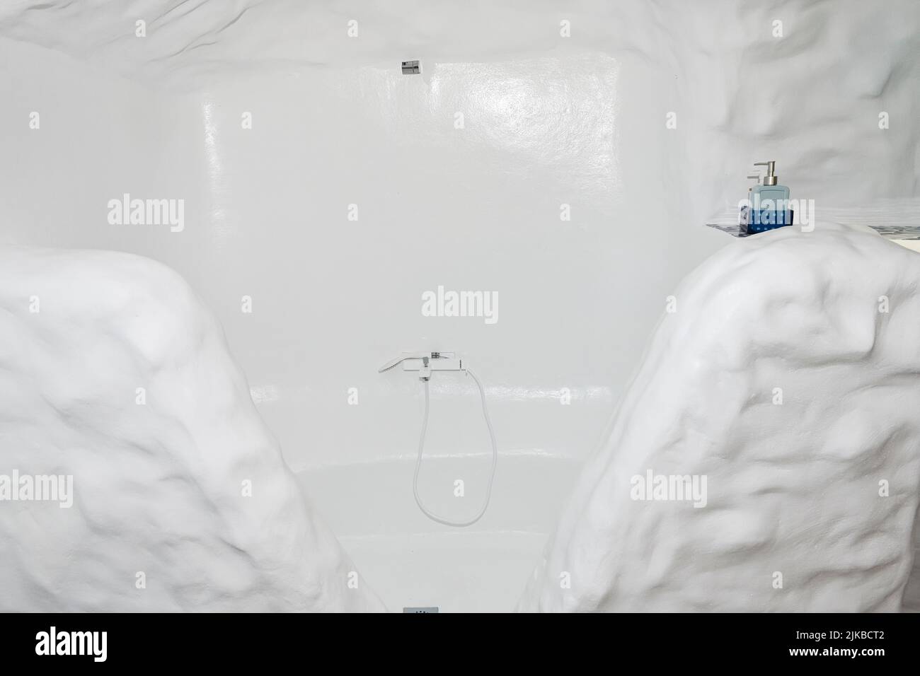 Bathroom inside modern cave for rural tourism Stock Photo - Alamy