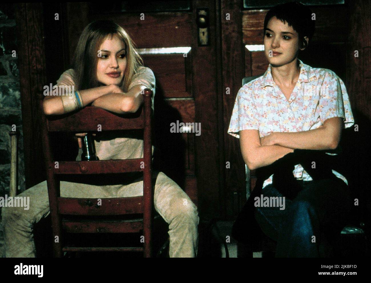 Facing backwards on chair hi-res stock photography and images - Alamy