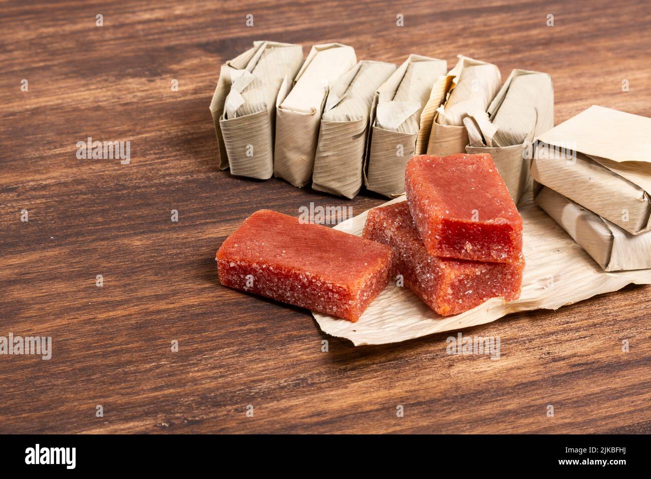 Guava Paste Wrapped in Bijao Leaf; Photo On Wood Background Stock Photo ...