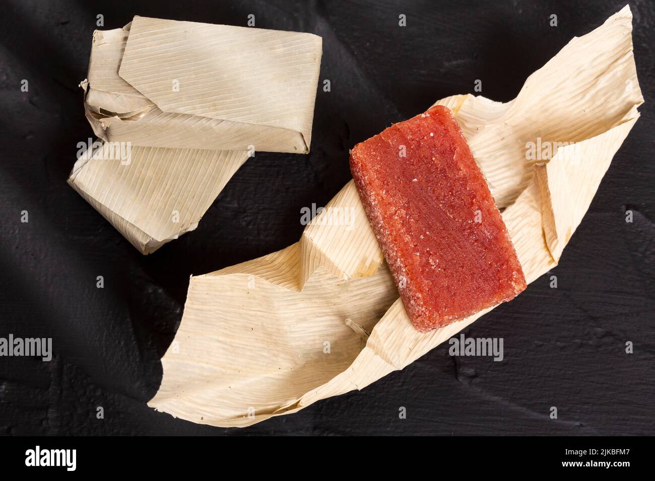 Guava Paste Wrapped in Bijao Leaf; Photo On Black Background Stock ...