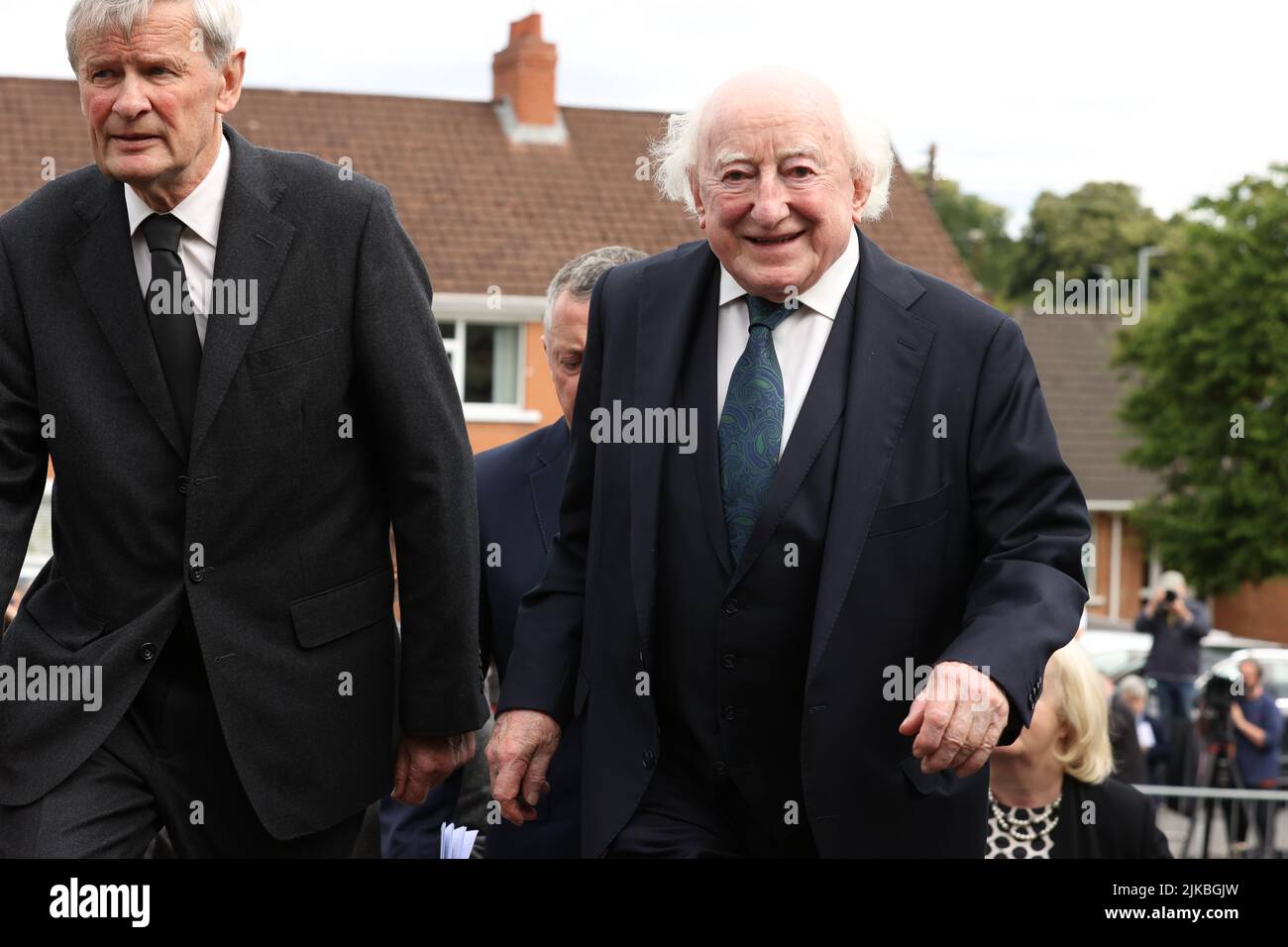 Irish president Michael D Higgins (right), arrives for the funeral of ...