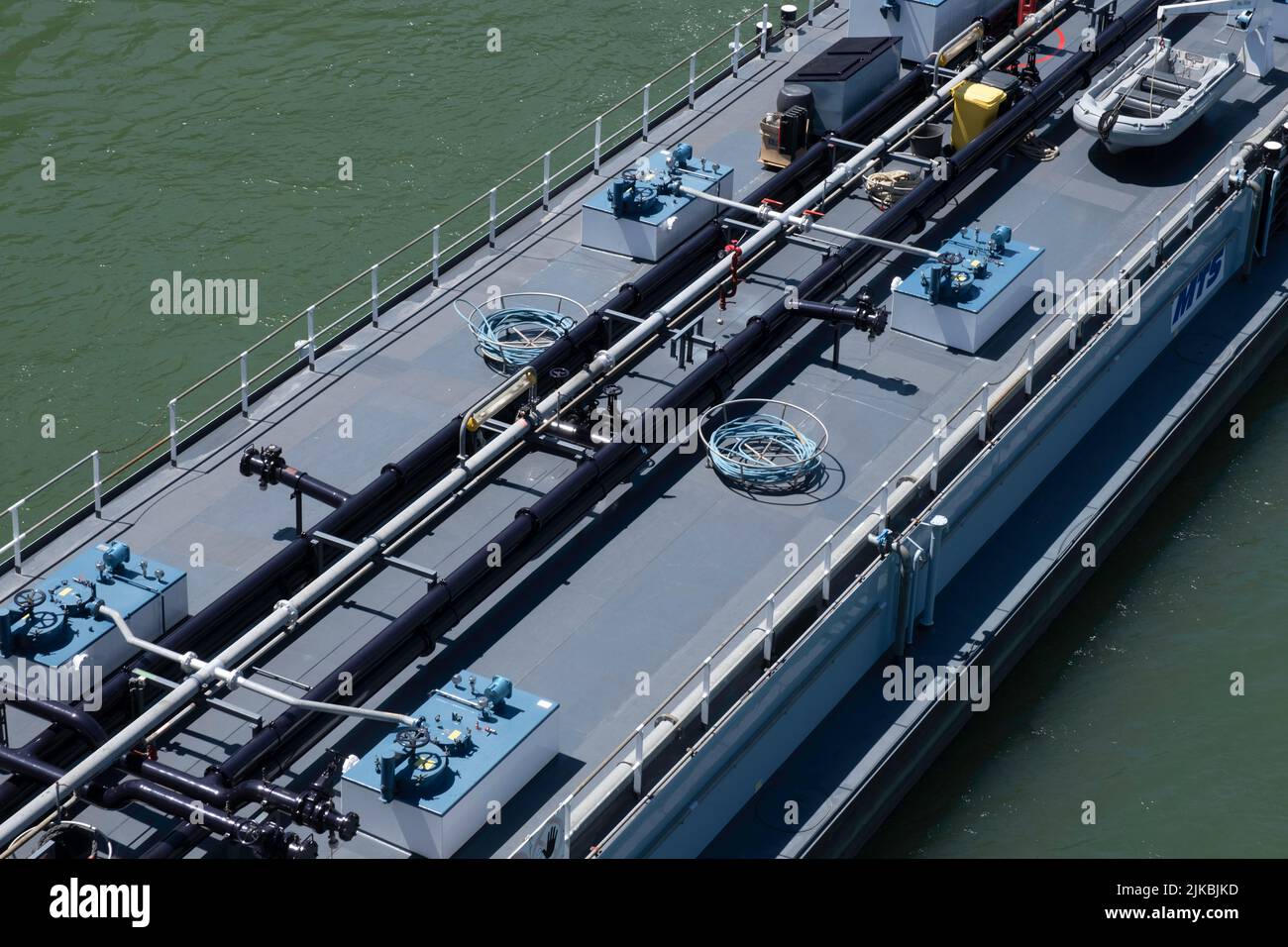 Barge seen from above with pipelines on the deck for industrial ...