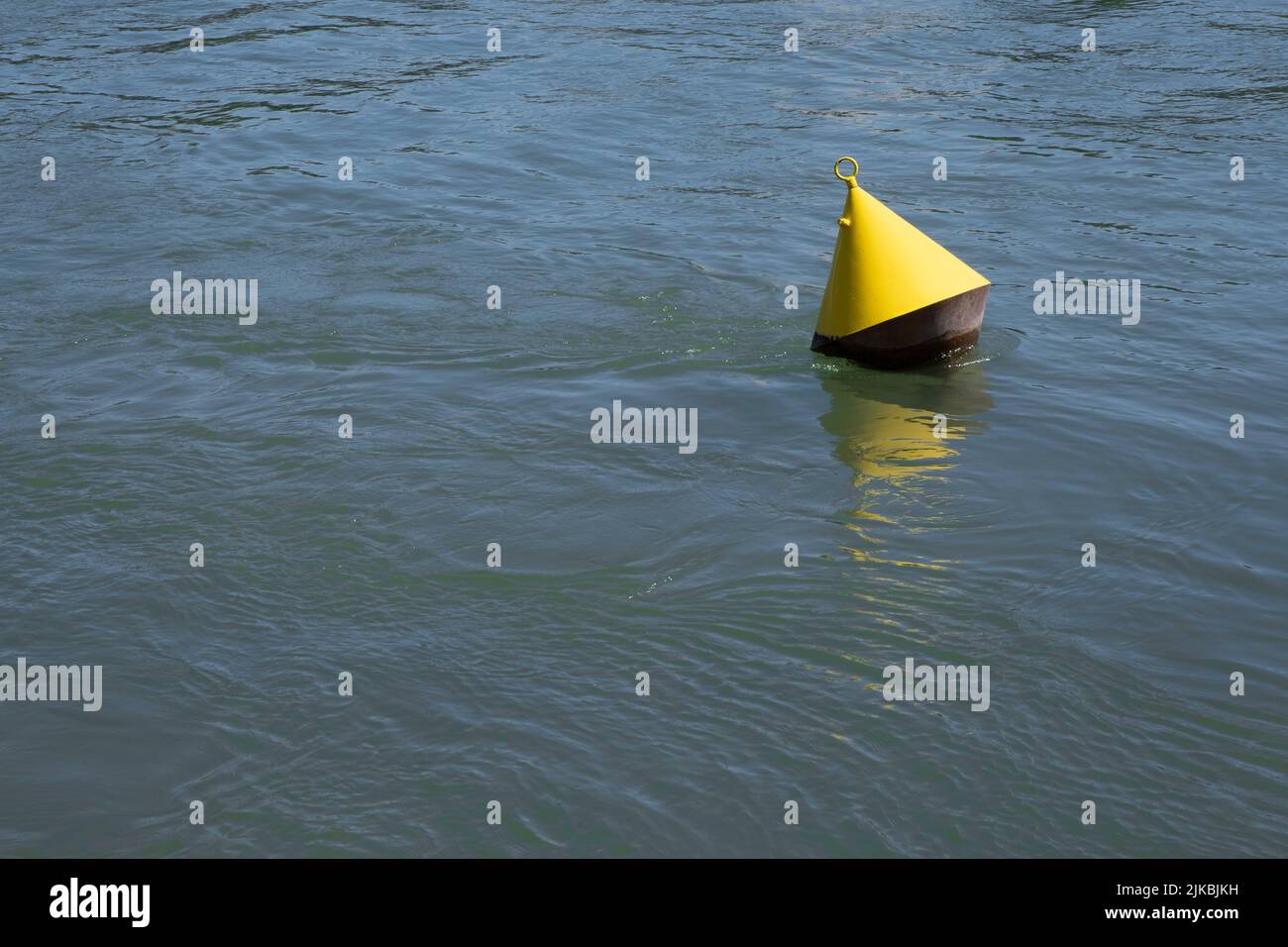 Yellow marker buoy in sea hi-res stock photography and images - Alamy