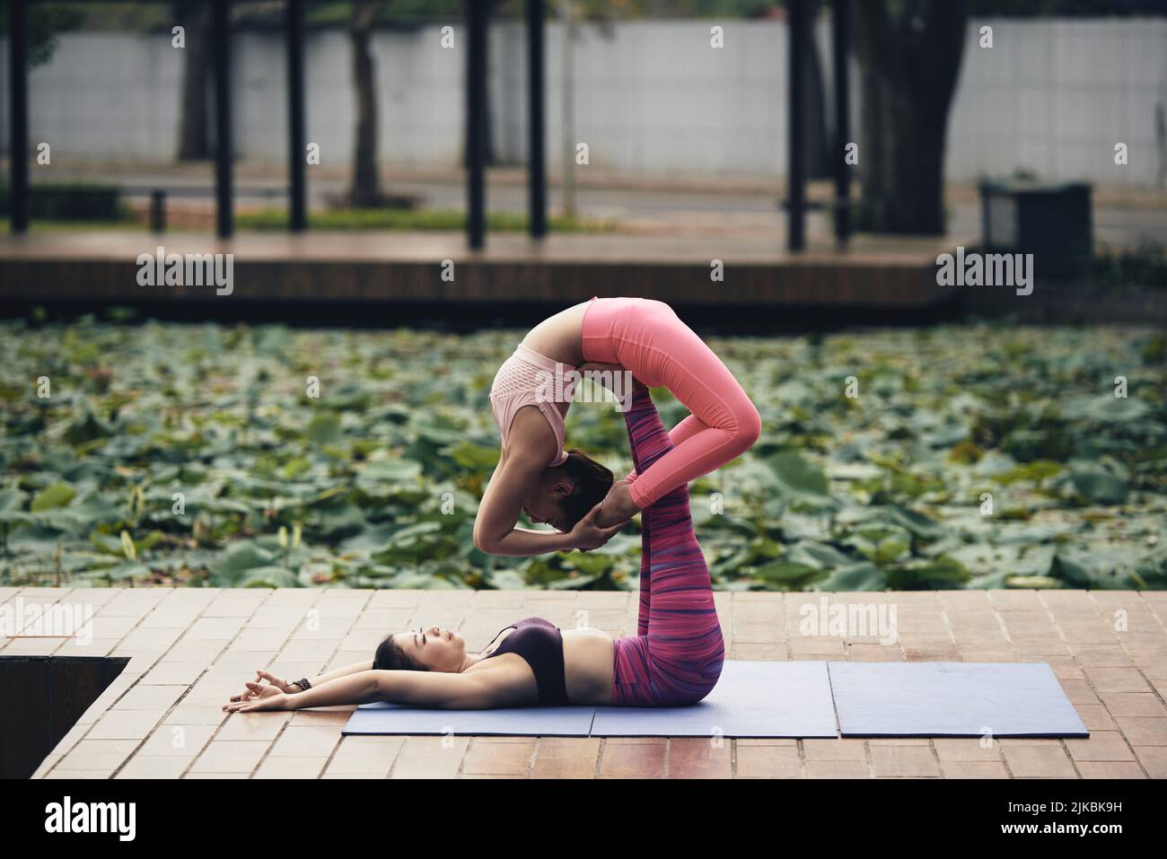 Group asian women in yoga hi-res stock photography and images - Alamy