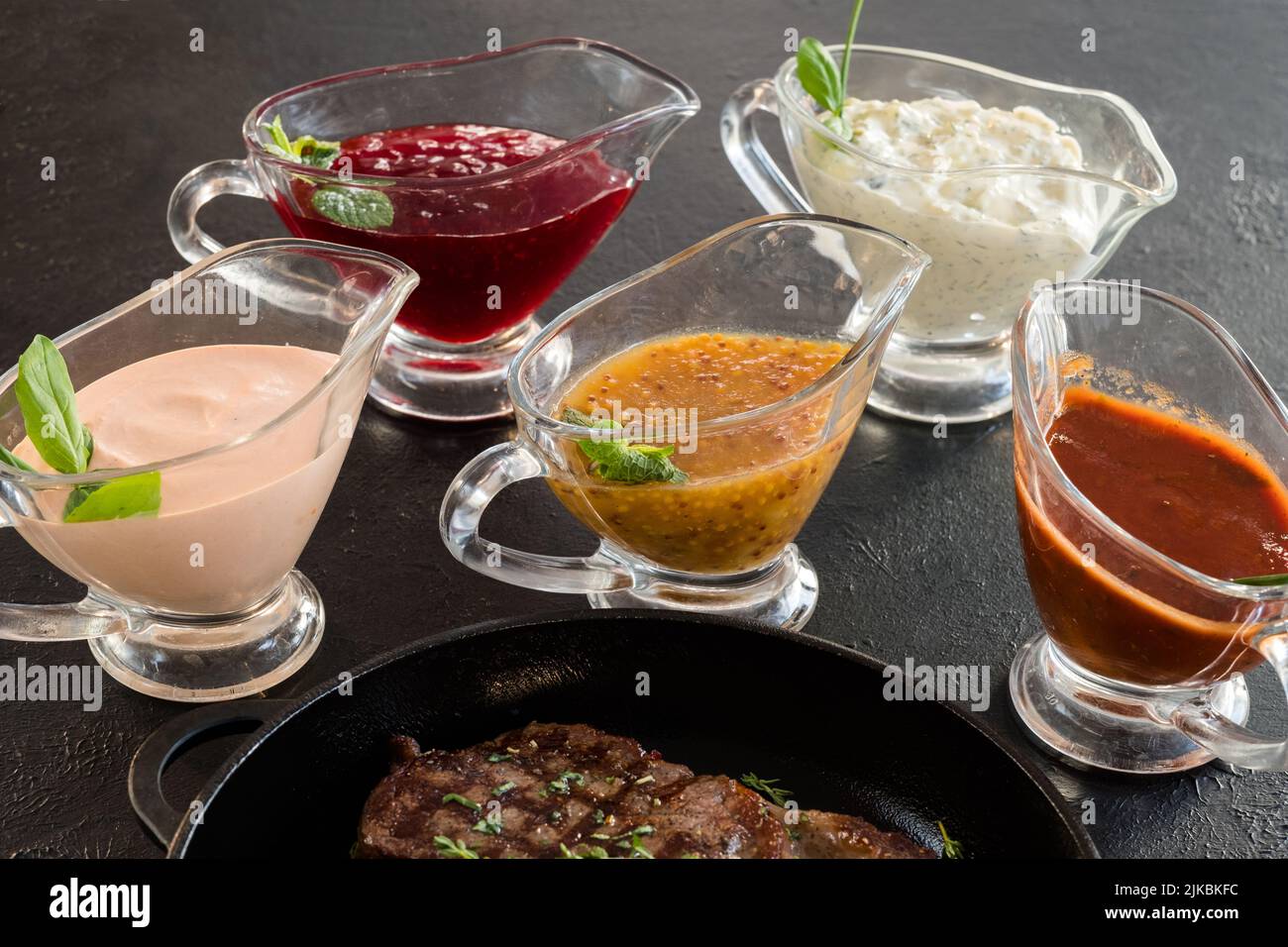 restaurant menu roasted meat sauce assortment Stock Photo - Alamy