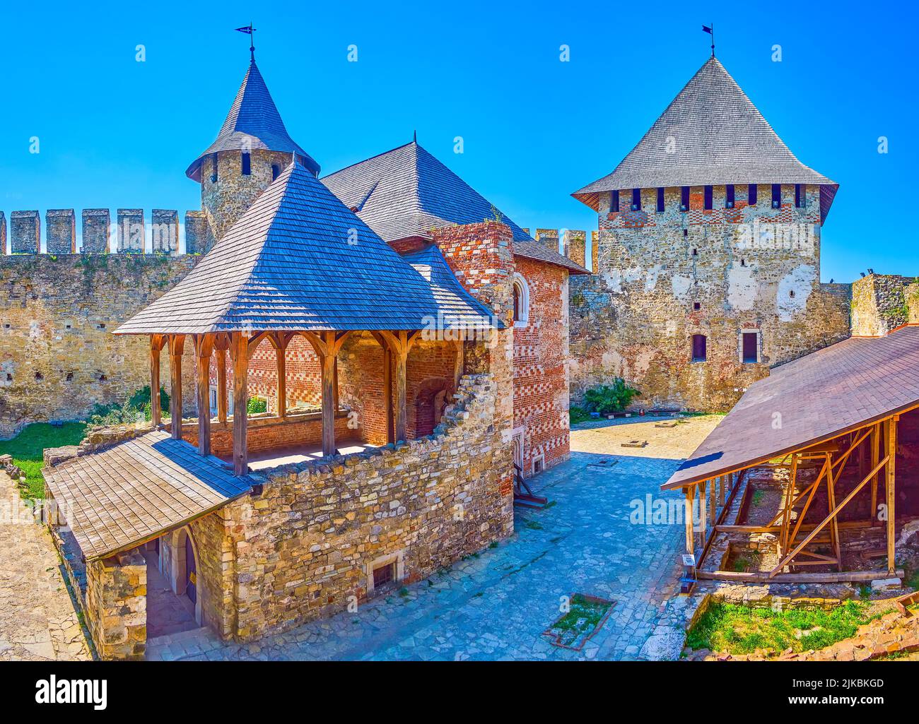 Spectacular view on preserved medieval buildings in the courtyard of ...