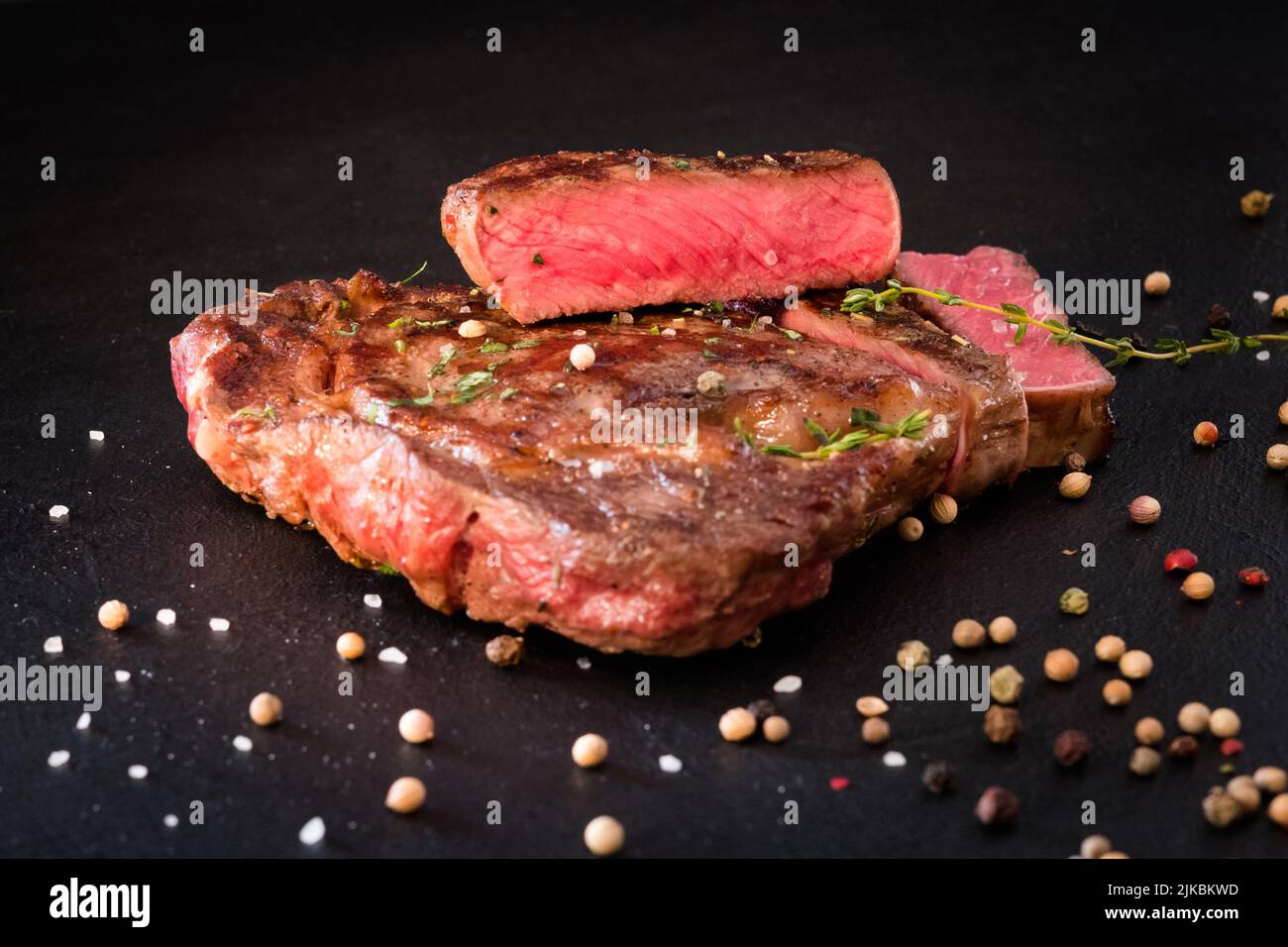 meat cooking food composition rare steak spice Stock Photo - Alamy