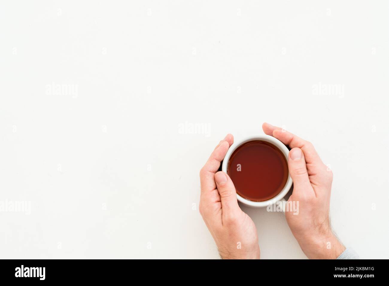 comfort drink hot cup tea hands background Stock Photo - Alamy