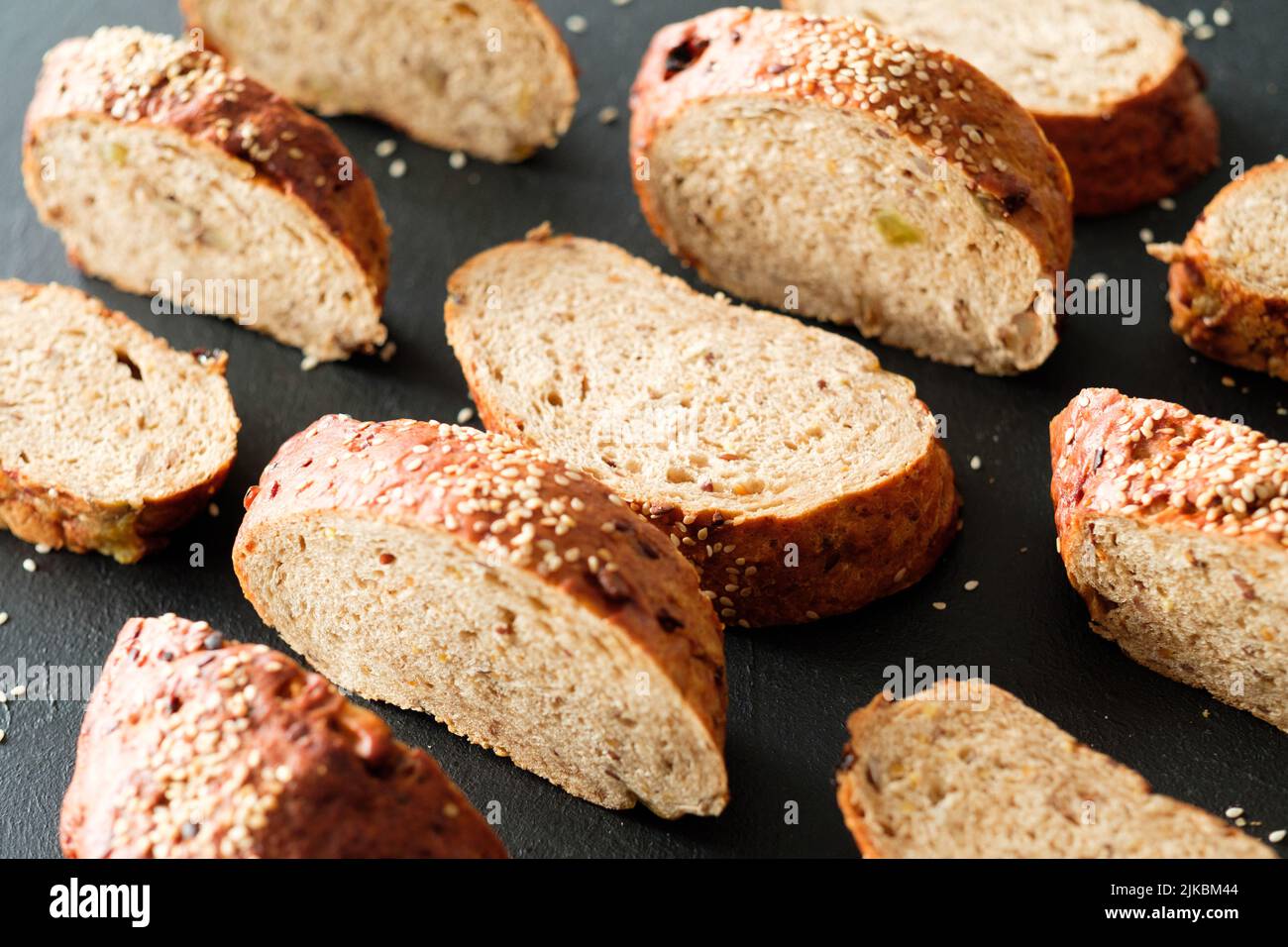 home made bakery wholegrain bread slices pattern Stock Photo - Alamy
