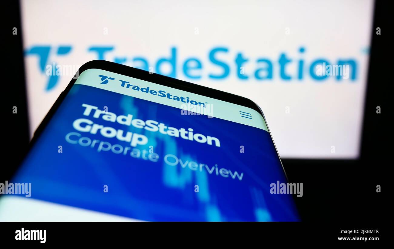 Smartphone with webpage of US brokerage company TradeStation Group Inc ...