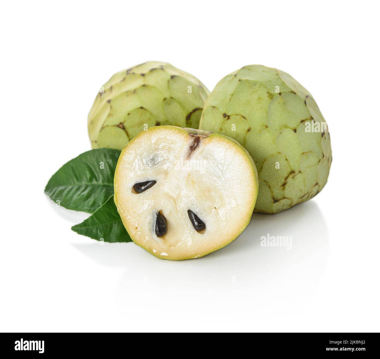 Whole and partial Cherimoya fruit isolated on white background ...