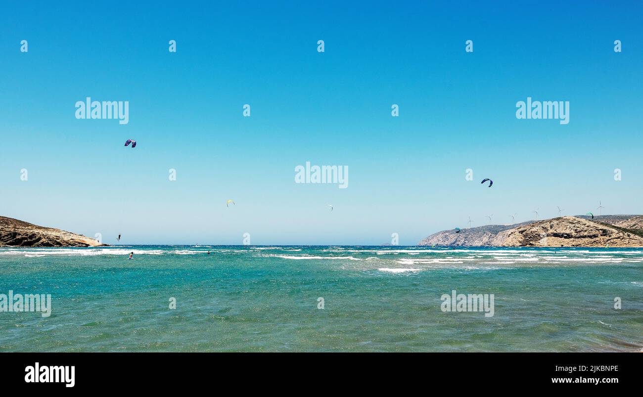 wide view of Kitesurfers flying on Prasonisi beach Stock Photo - Alamy