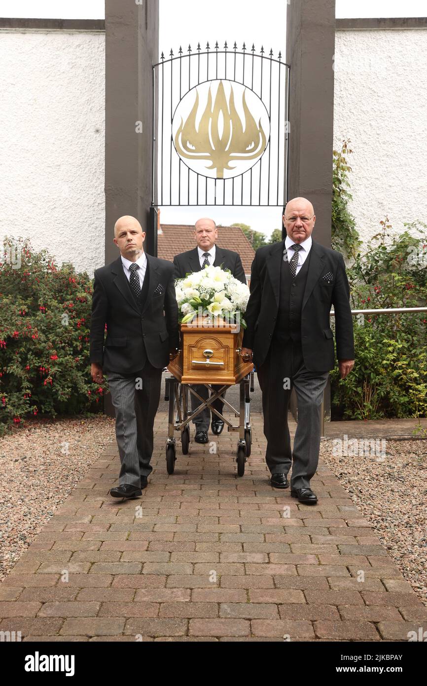 Pallbearers carry the coffin of Northern Ireland first minister and UUP ...